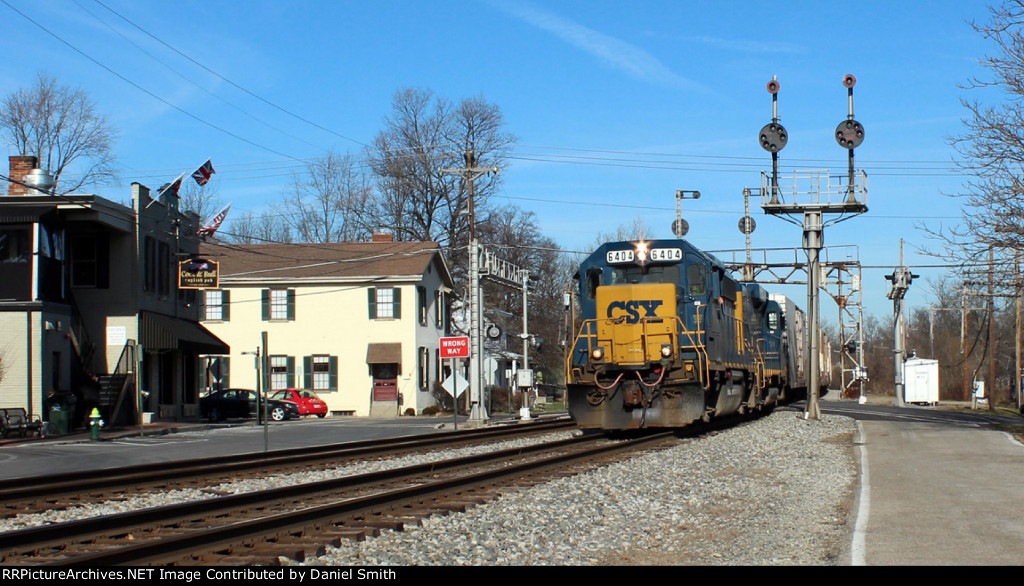 CSX 6404 leads seven Triopican car south-bound